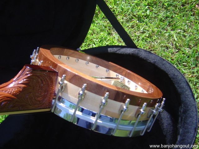 Top of the line Open Back Banjo. Solid block maple rim walnut cap ...