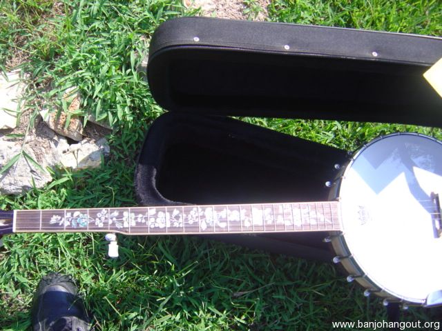 Top of the line Open Back Banjo. Solid block maple rim walnut cap ...