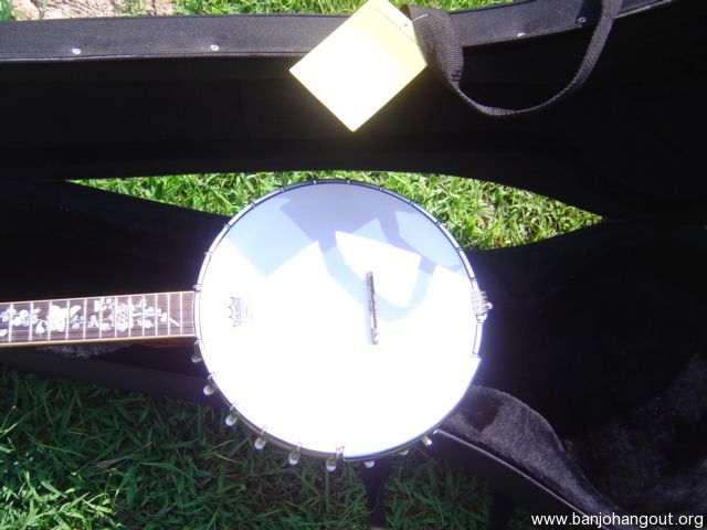 Top of the line Open Back Banjo. Solid block maple rim walnut cap ...