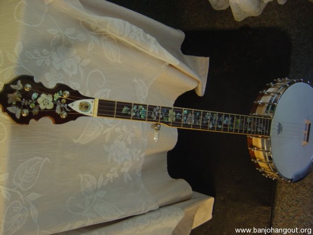 Top of the line Open Back Banjo. Solid block maple rim walnut cap ...