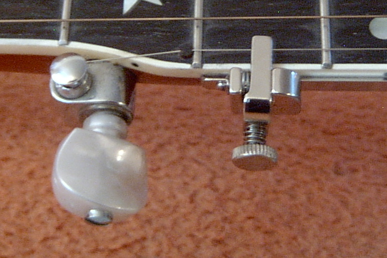 5th string spikes - are they 'that' much better than a 5th string capo ...