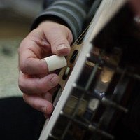 Playing Irish banjo with a thimble on The Session